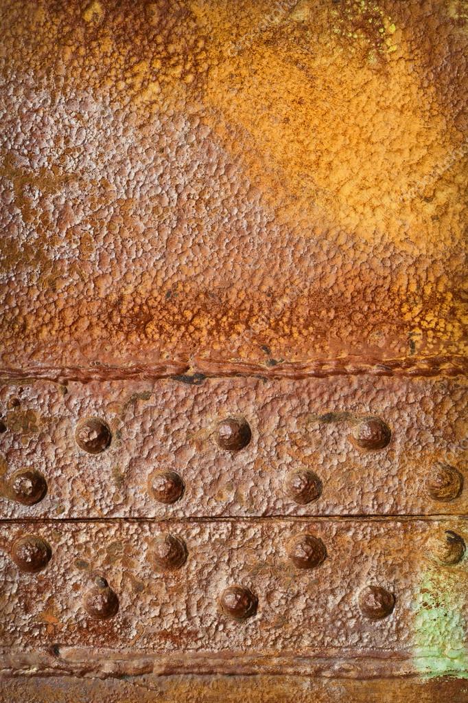 Rusted Metal Plate With Rivets