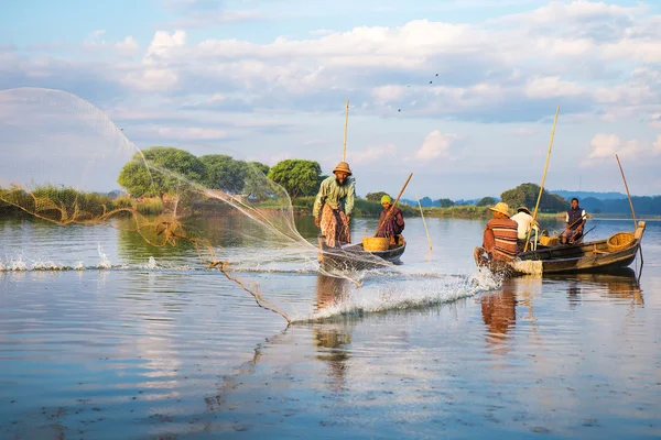 Fishermen catch fish - Stock Image - Everypixel