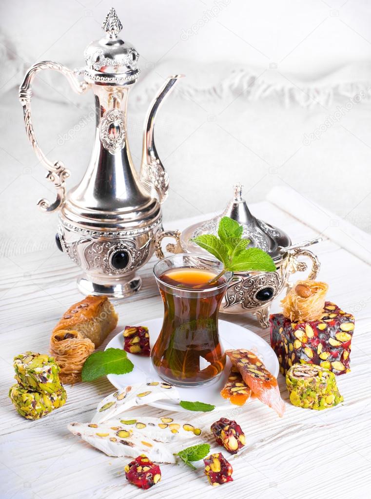 Tea with Turkish sweets Stock Photo by ©seqoya 43547443