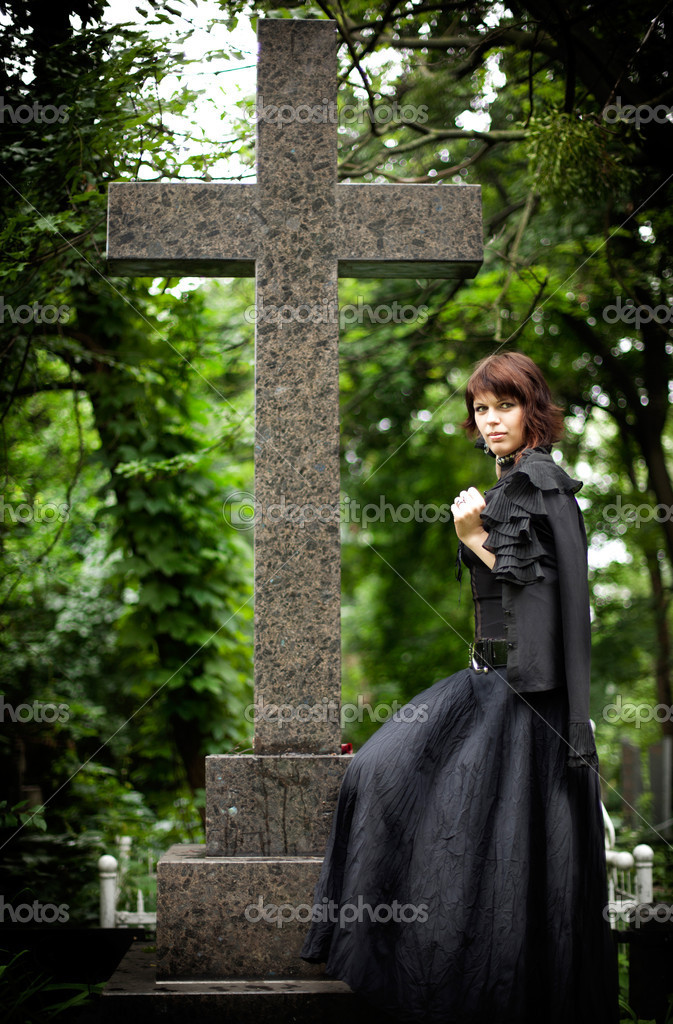 Gothic girl at cemetery — Stock Photo © merrydolla #16213929