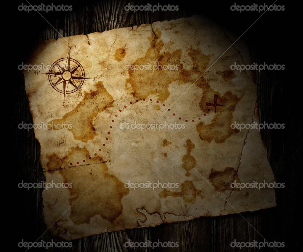 Old treasure map on wooden background Stock Photo by ©merrydolla 24775377