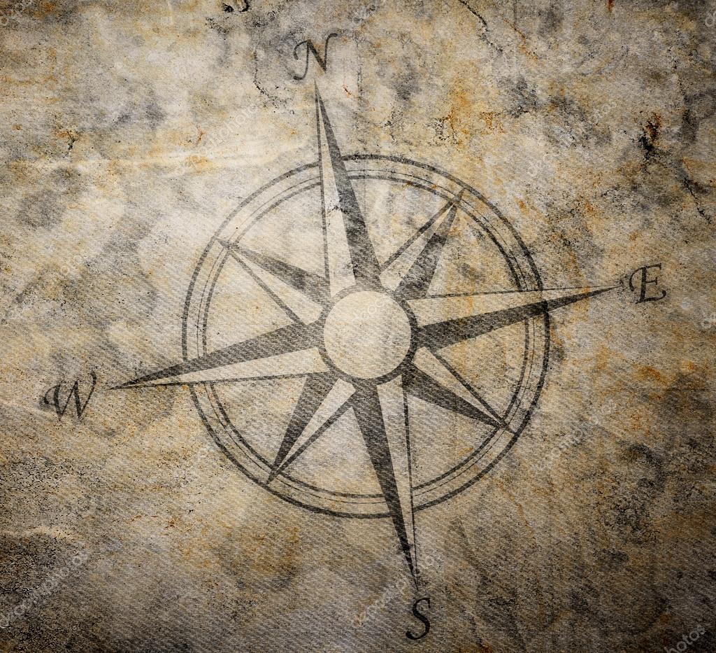 Old compass on paper background — Stock Photo © merrydolla #27521635