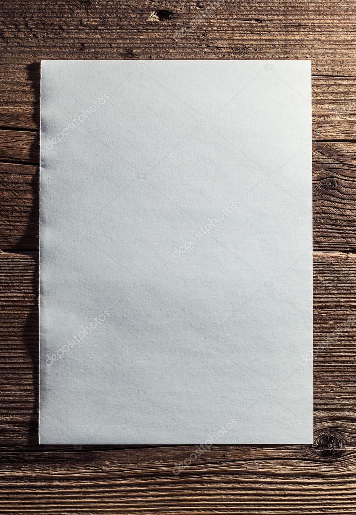 White paper on wood background — Stock Photo © merrydolla #36514715