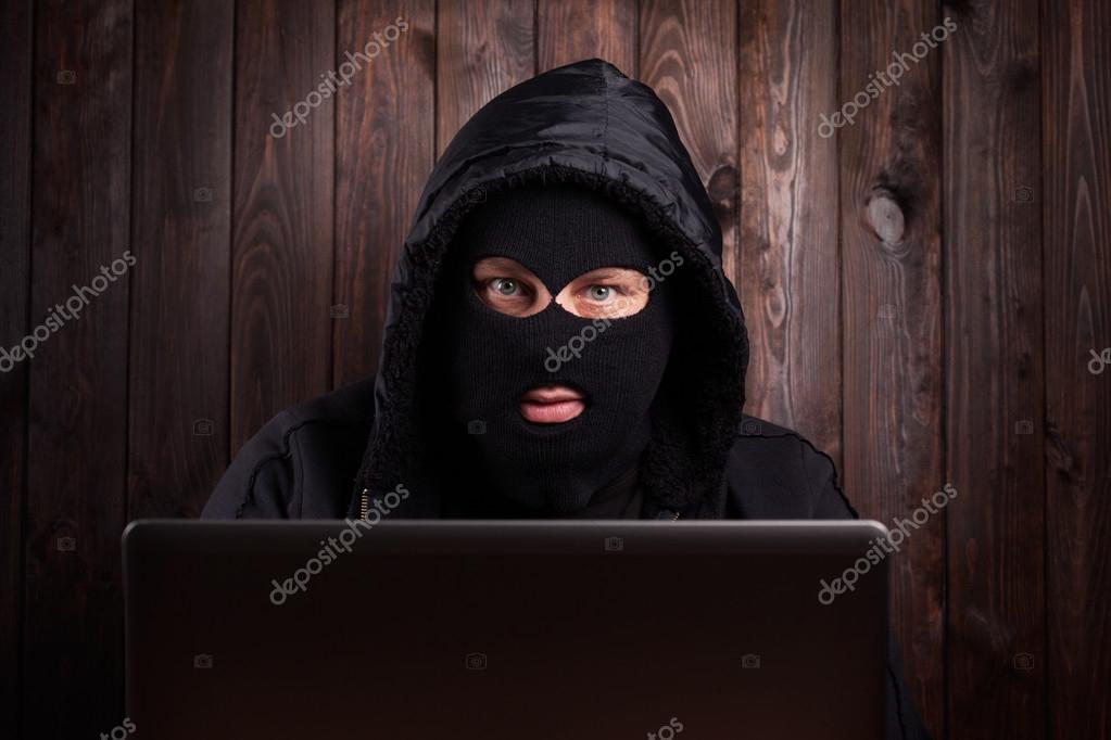 Hacker in a balaclava Stock Photo by ©merrydolla 48876891