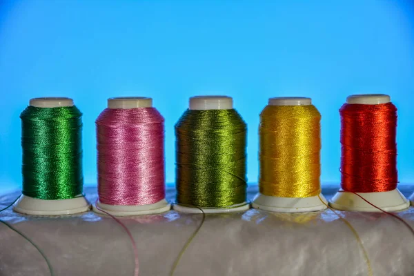Mixture of colourful spools of thread.Yarn on a spool, cotton thread ...