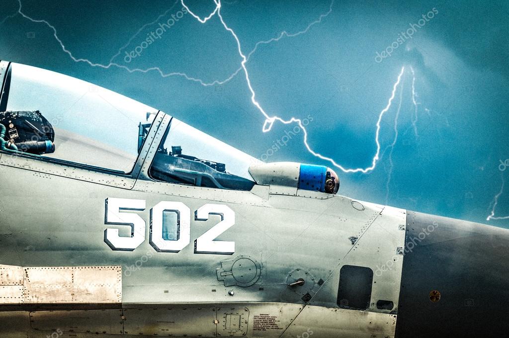 Russian fighter with gloomy sky background. — Stock Photo © kyolshin ...