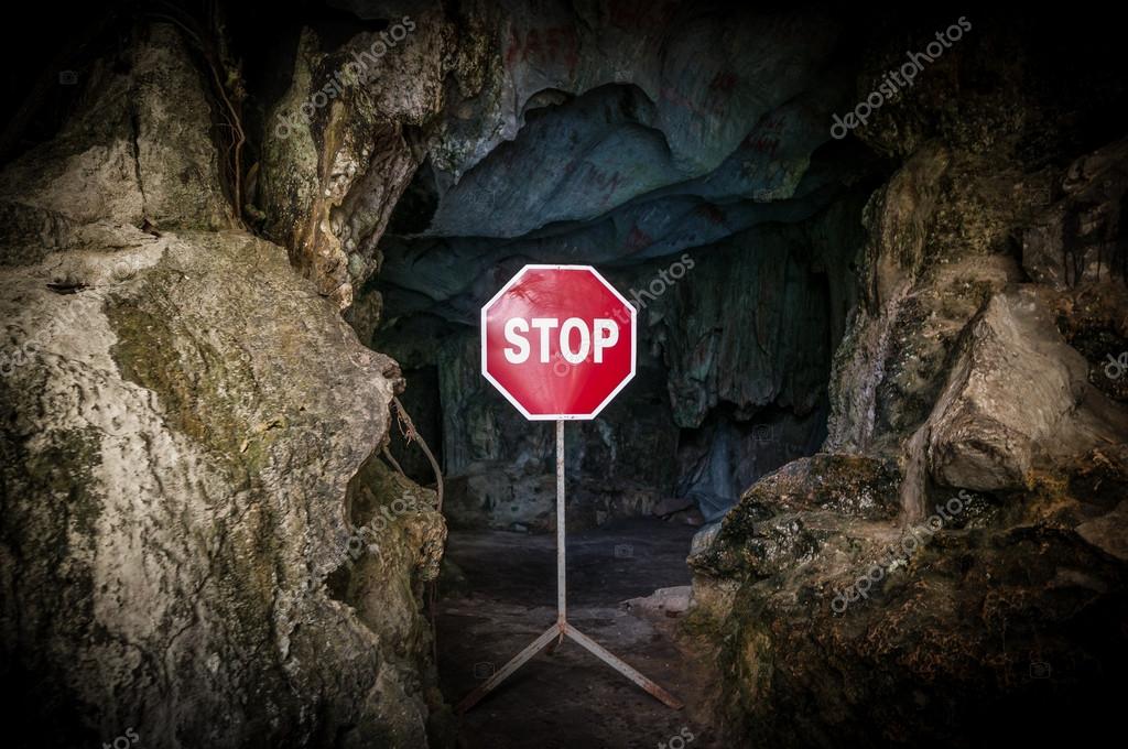 Entry to cave blocked with STOP sign — Stock Photo © kyolshin #45069045