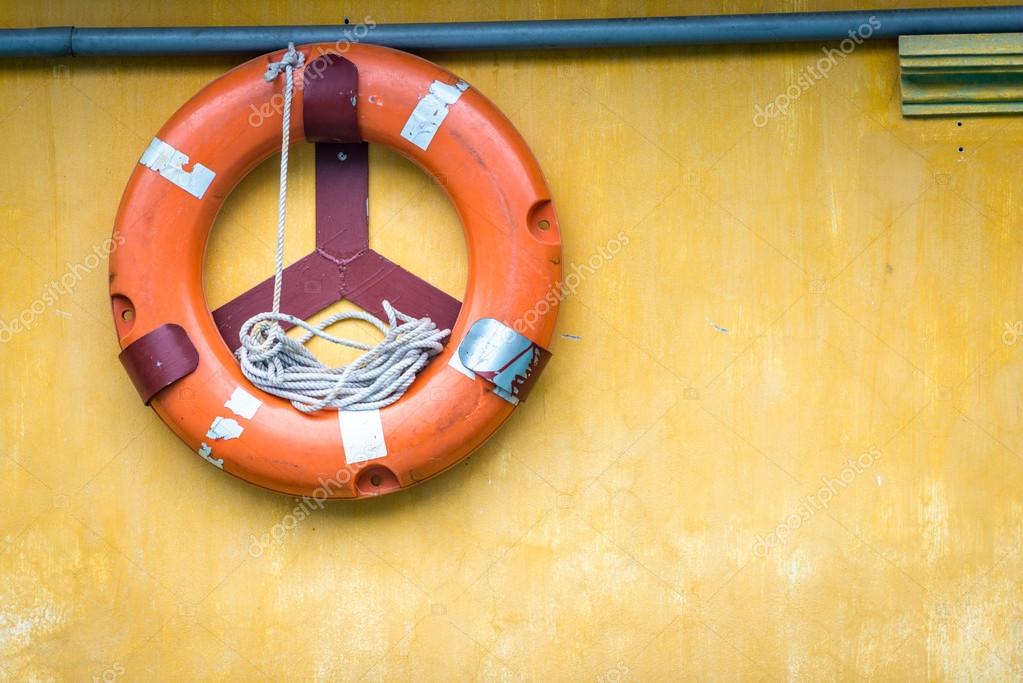 Orange old lifebuoy with rope — Stock Photo © kyolshin #45072585