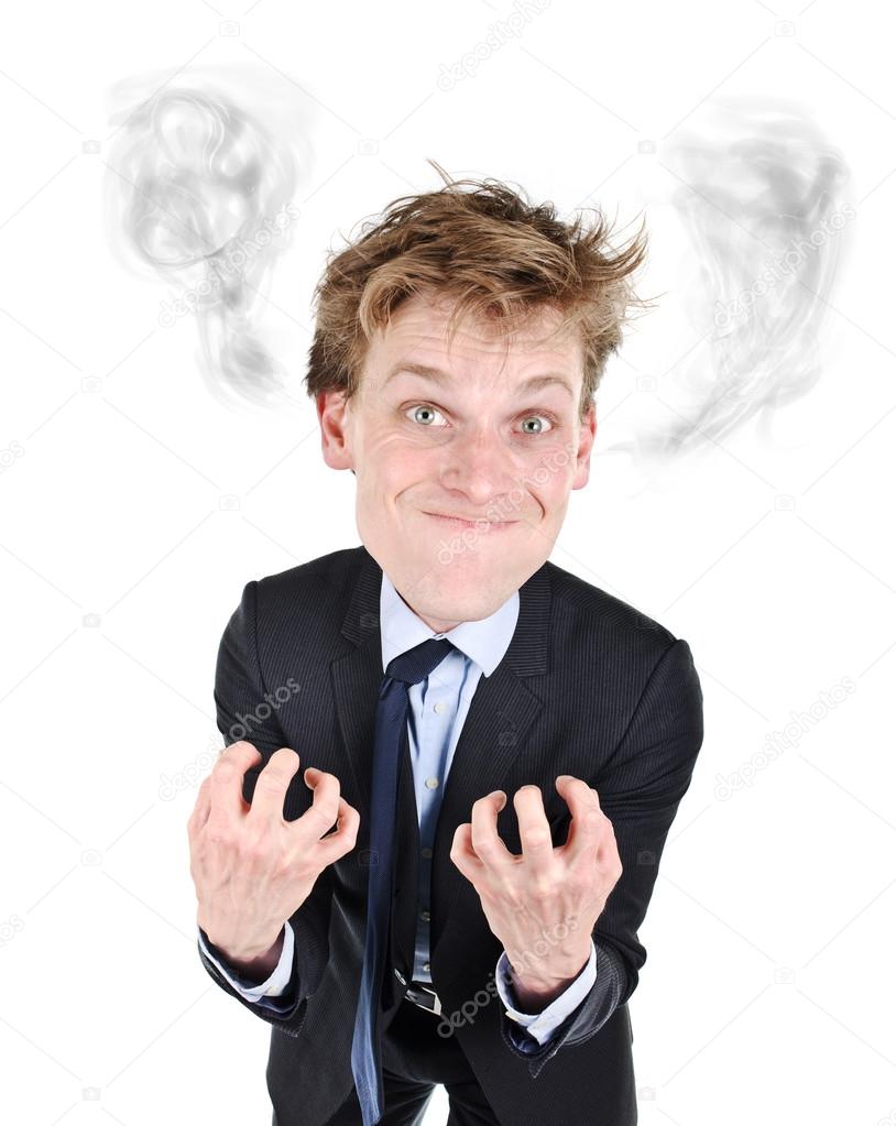 Angry smoking businessman — Stock Photo © Mactrunk #25344457