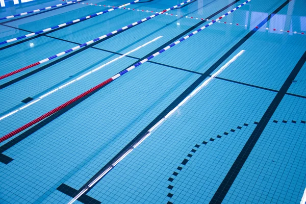 Swimming pool lanes — Stock Photo © Mactrunk #37589615
