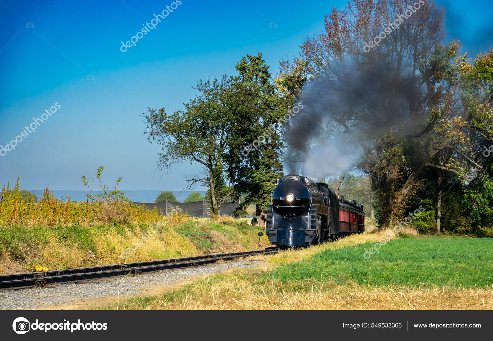 Antique Restored Steam Engine Approaching on Some Old Rail Road Tracks ...