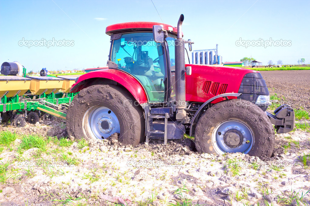 Red tractor — Stock Photo © overcrew #25588431
