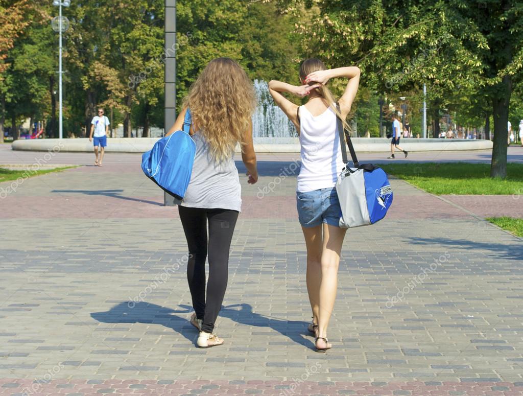 Two girls walk to the training session — Stock Editorial Photo ...