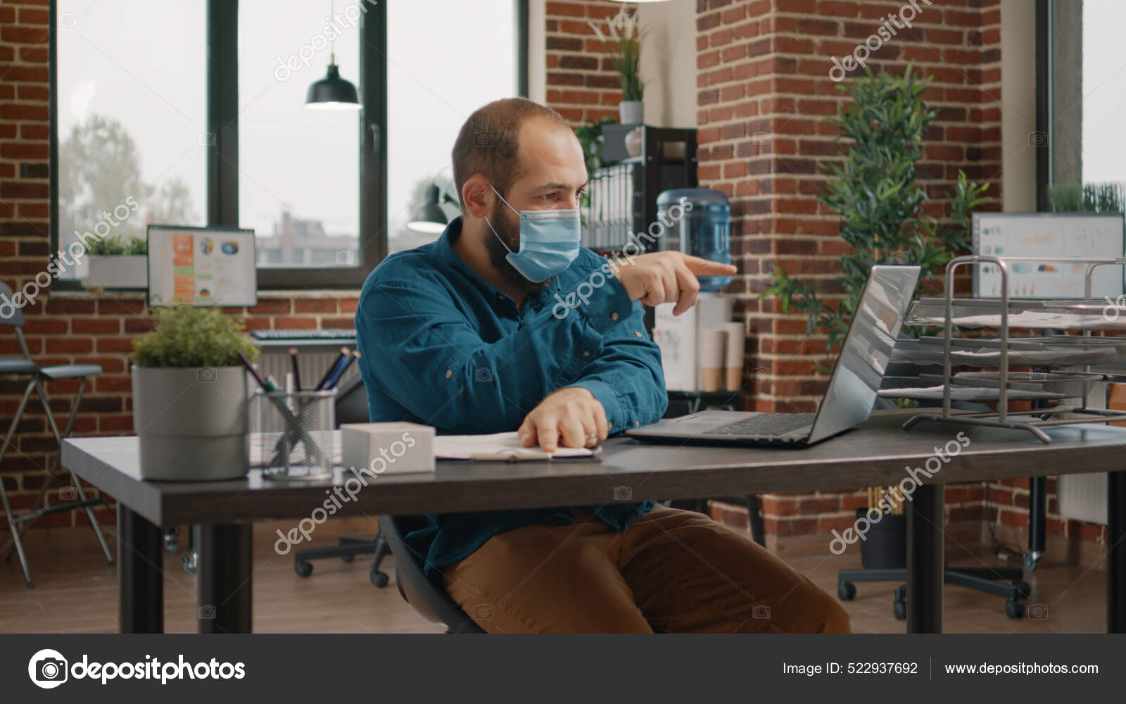 Employee looking at charts papers and laptop to work — Stock Photo ...