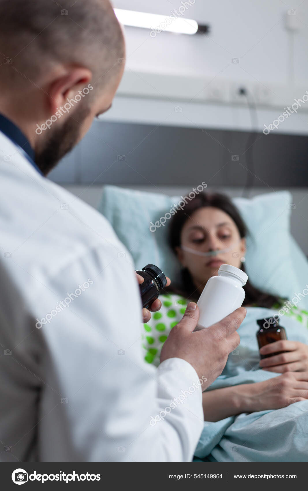 Focus on prescription drugs medication bottle given by doctor to ...