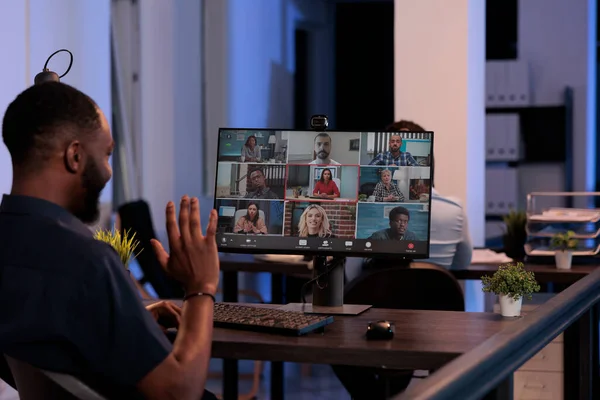 Company employee attending business meeting on videocall conference ...