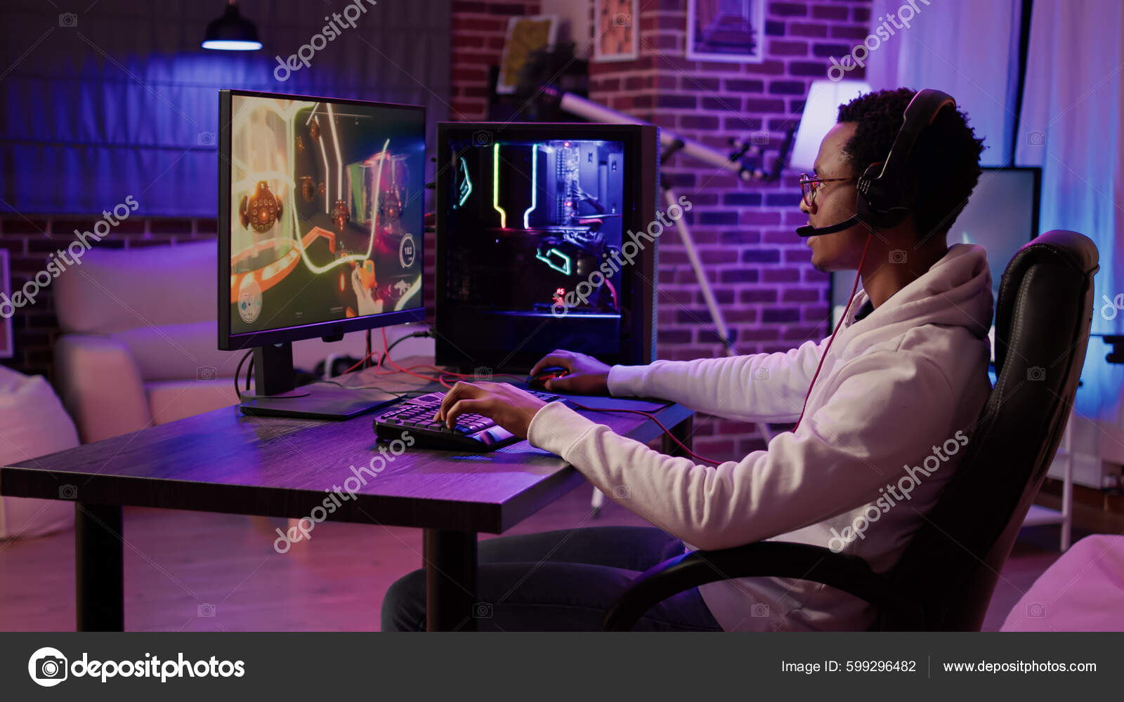 African American Gamer Playing Intense Action Game Tournament Talking ...