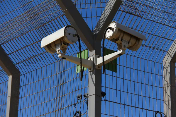 Electric Fence and Security Camera Atop Boundary Wall — Stock Photo ...