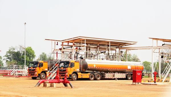 Car truck in loading bay loading crude oil — Stock Editorial Photo ...