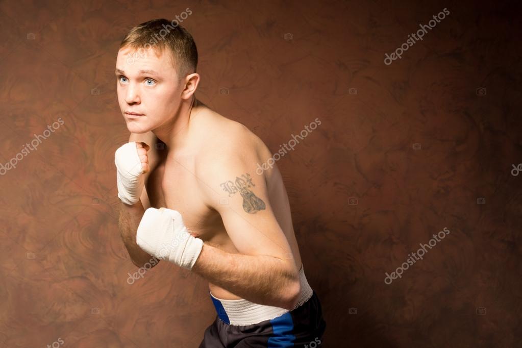 Young boxer training before a match — Stock Photo © Vaicheslav #42140763