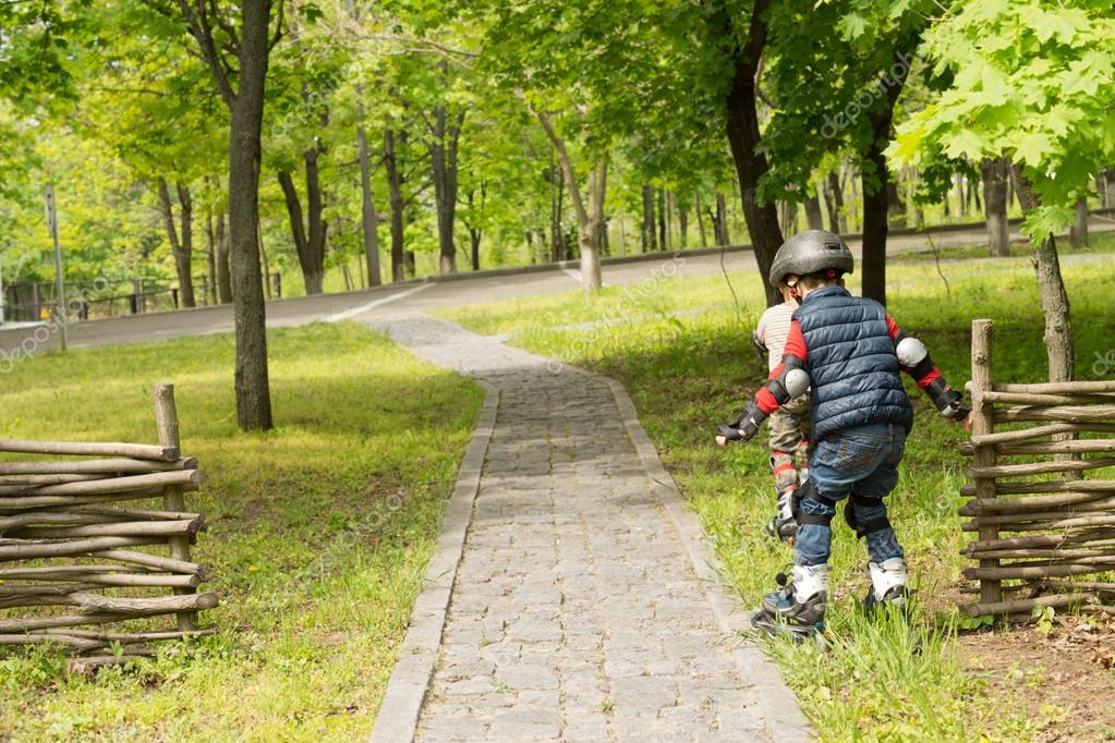 Two young boys in roller blades — Stock Photo © Vaicheslav #45308715