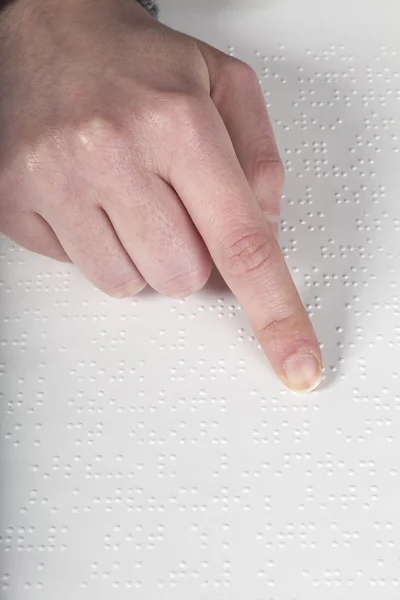 Blind reading text in braille language Stock Photo by ©vverve 41253763