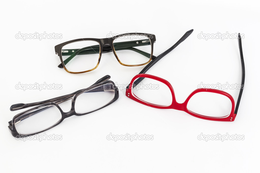 Many red and black eyeglasses Stock Photo by ©chatsimo 24021379