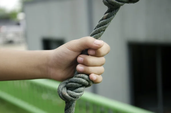 Teenager swinging rope Stock Photos, Royalty Free Teenager swinging ...