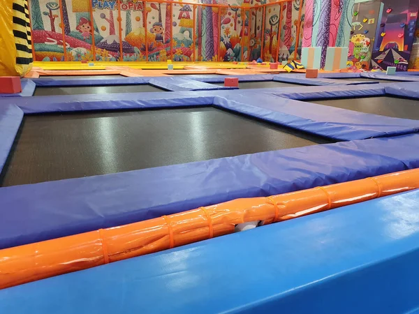 Kids jumping center Stock Photos, Royalty Free Kids jumping center ...