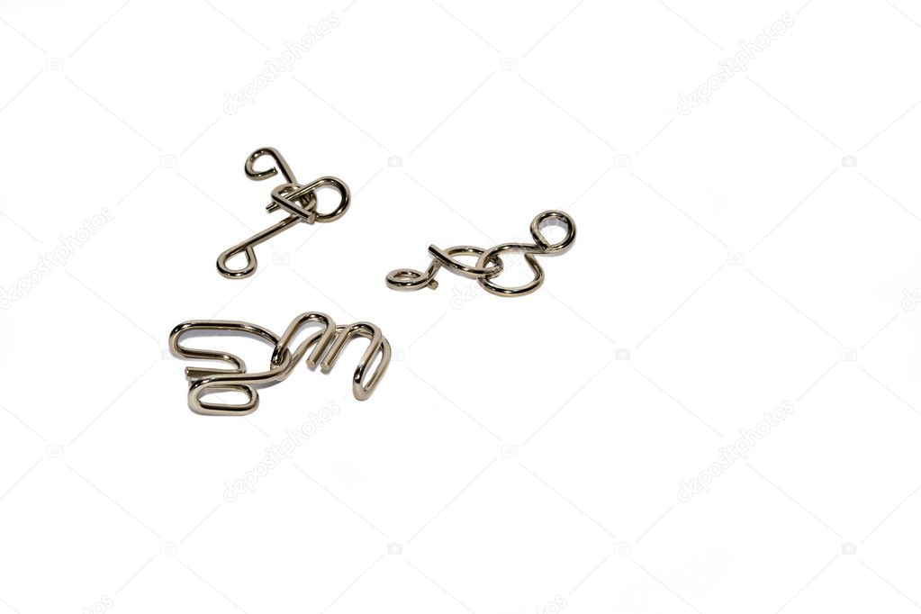 Three ferrous puzzles Stock Photo by ©Nikolay_Donetsk 19472953