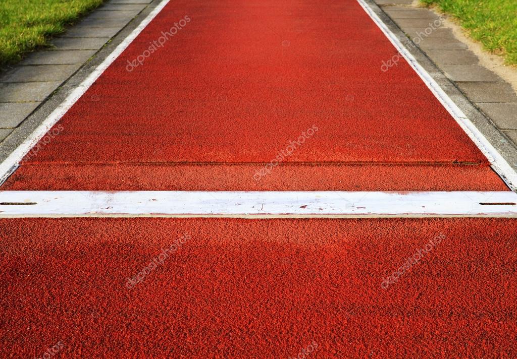 Long jump spring plank in an outdoor stadium Stock Photo by ...