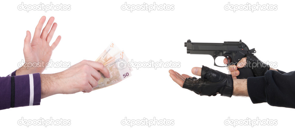 Robber with gun taking money from victim Stock Photo by ©ijdema 16859425