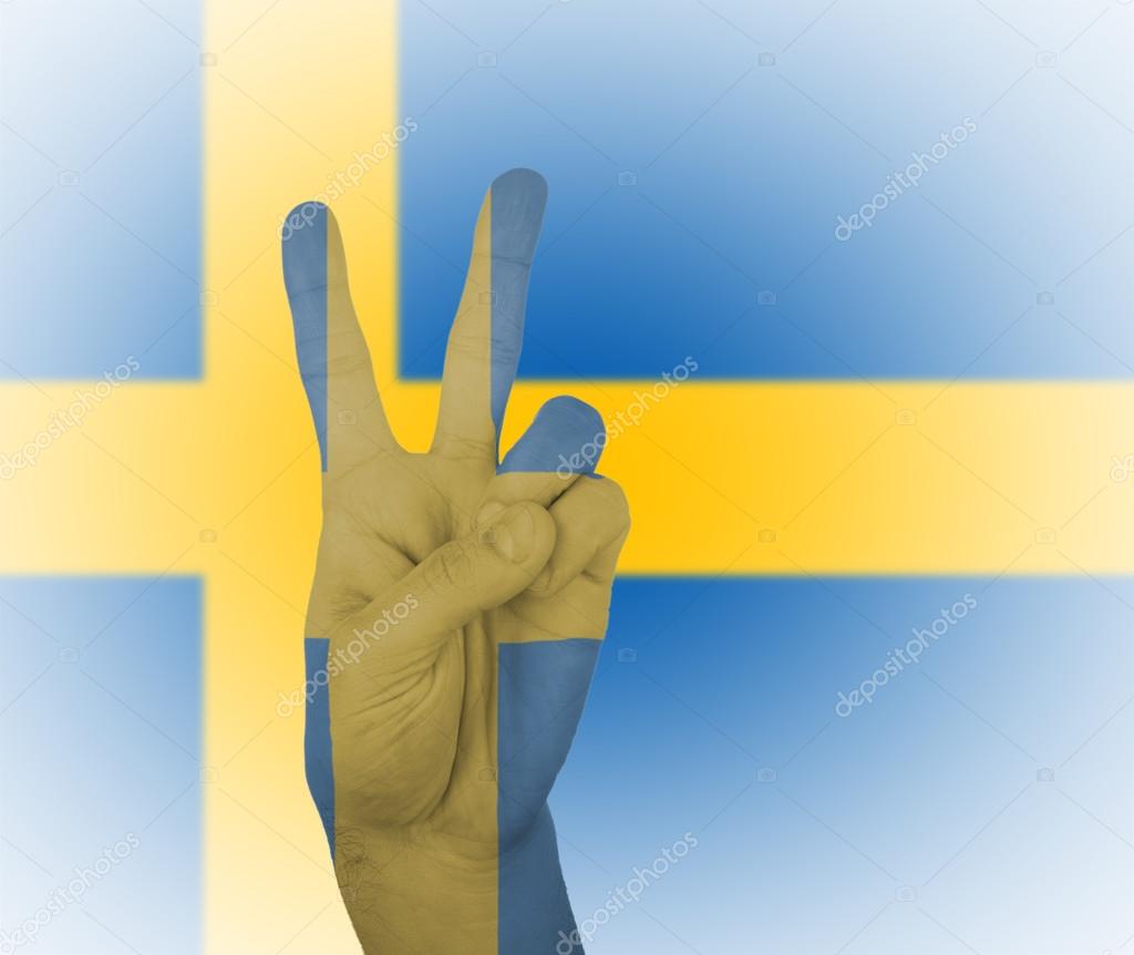 Hand peace sign with flag of Sweden — Stock Photo © ijdema #41260147