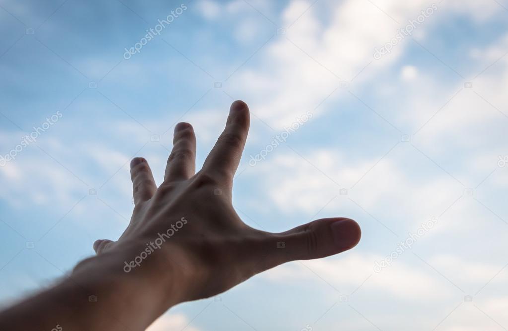 Hand reaching to sky. Stock Photo by ©eevl 29680573