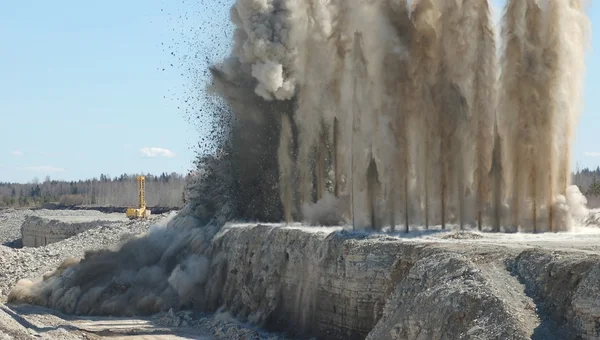 Limestone explosion in open pit mining quarry Stock Photos, Royalty ...