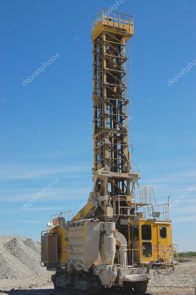 Drilling machine in open pit — Stock Photo © koer #12692164
