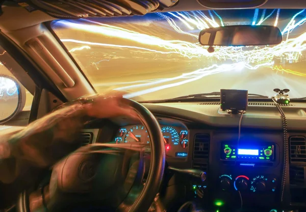 Vision of an autonomous car driving at night in a lighted tunnel ...