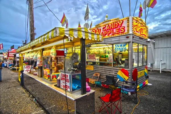Fair Corn Dogs, part of the midway at state fair - Stock Image - Everypixel