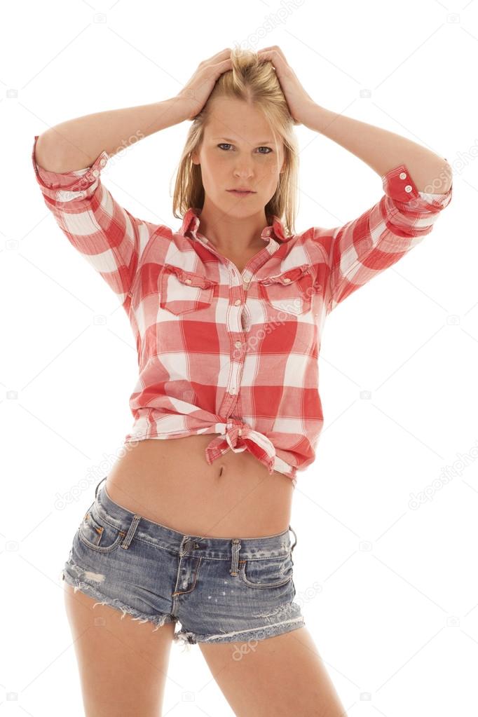 Woman red plaid shirt shorts hands hair — Stock Photo © alanpoulson #25710229