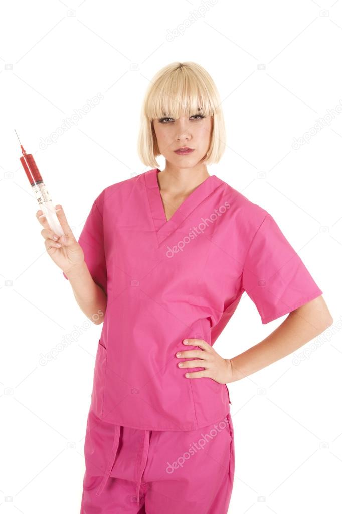 Nurse with big shot needle serious fron Stock Photo by ©alanpoulson ...