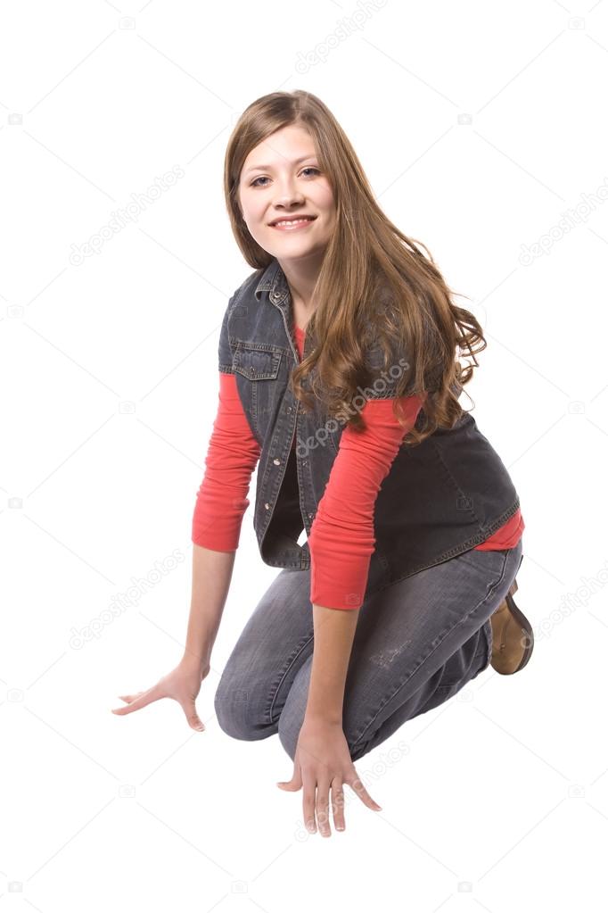 Woman kneeling and smiling on white Stock Photo by ©alanpoulson 29581103