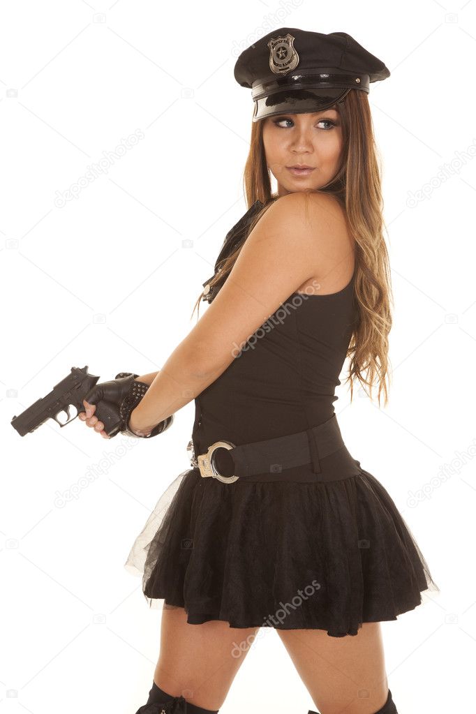 Cop woman gun look back — Stock Photo © alanpoulson #34963507