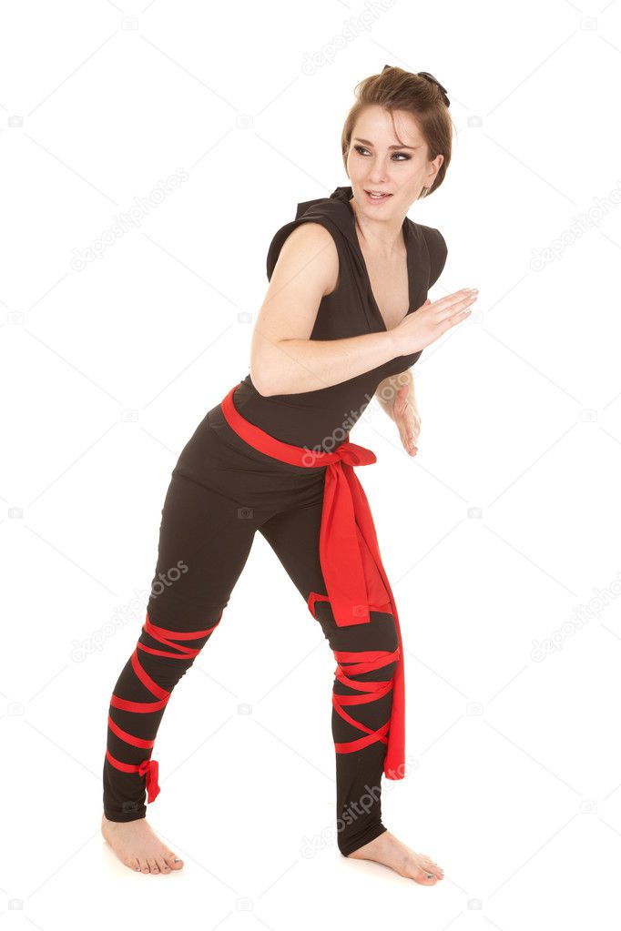Woman ninja arm moves look back — Stock Photo © alanpoulson #36210209