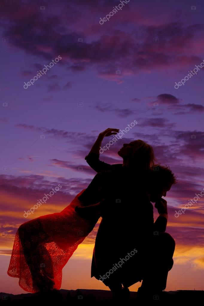 Silhouette woman lean back on man hand over face — Stock Photo ...