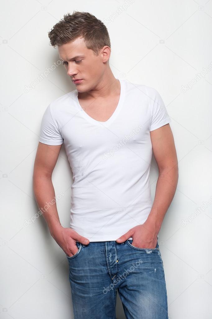 Handsome Guy in Jeans — Stock Photo © mimagephotos #22403939 Handsome Guy in Jeans — Stock Photo © mimagephotos #22403939