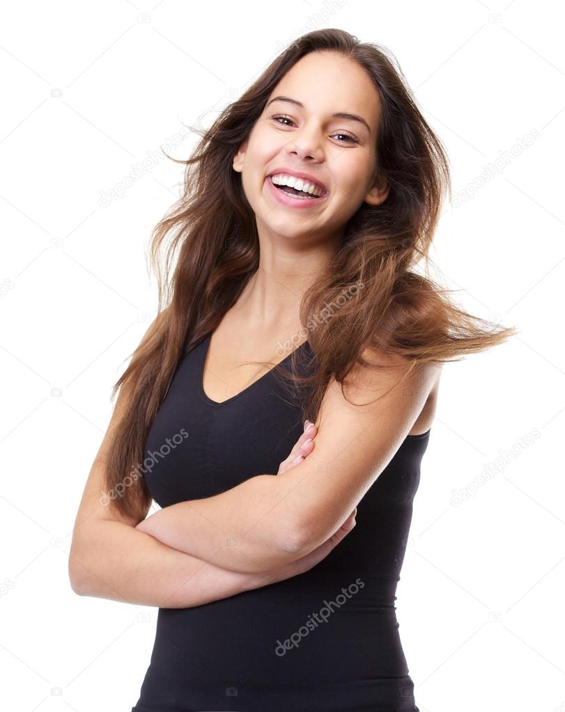 Beautiful young woman laughing with arms crossed Stock Photo by ...