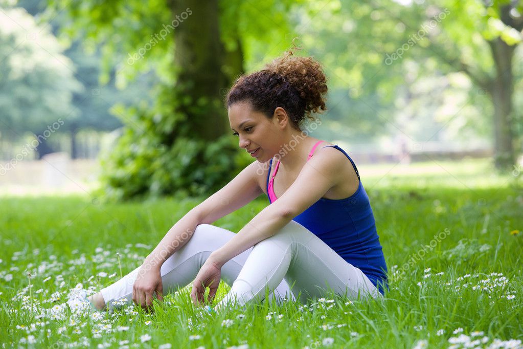 Woman relaxing after workout — Stock Photo © mimagephotos #47743031
