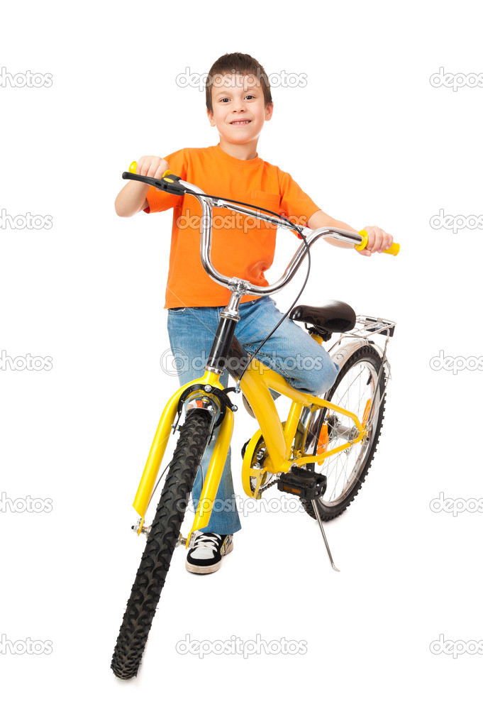 Boy on bicycle Stock Photo by ©soleg 33173795
