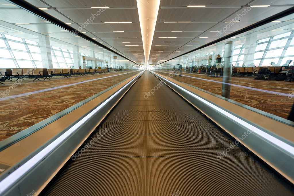 Dynamic view of moving walkway in international airport, Delhi, India ...