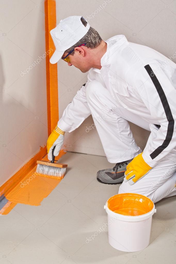 Worker waterproofing around the wall and floor — Stock Photo ...